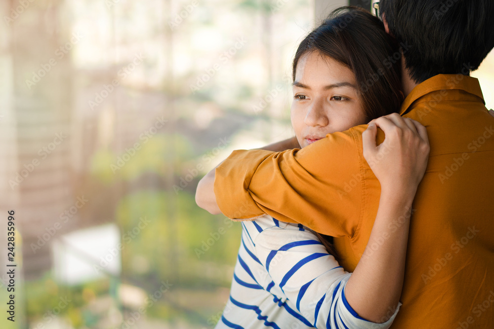 Young depressed asian woman hug her friend for encouragement, Selective ...