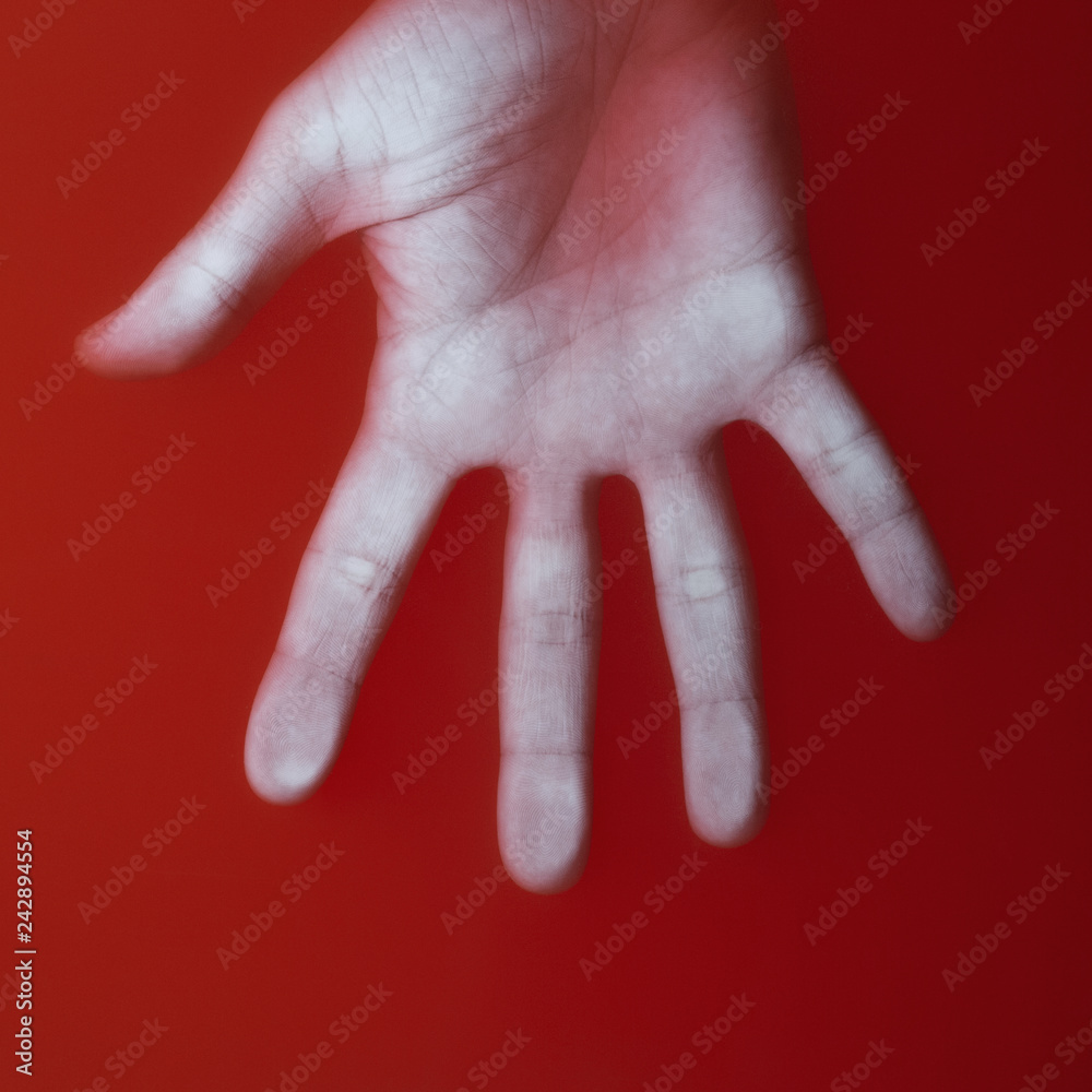 man palm in red blood water, male hand, cover for art in horror genre ...