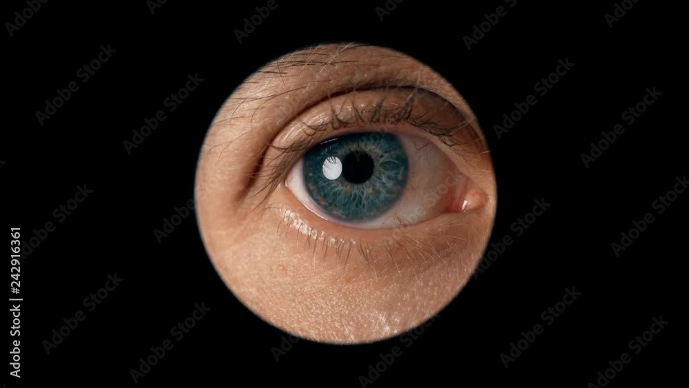 the human eye looks into the eyepiece of the microscope Stock ビデオ ...