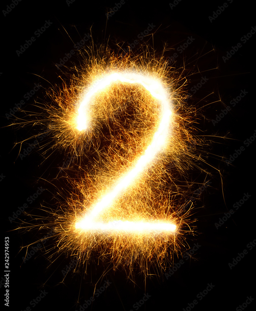 Number 2 drawn with spaklers on a black background | Uwalls.co.uk