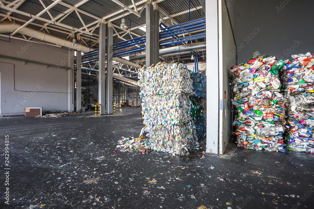 Plastic bales of rubbish at the waste treatment processing plant ...