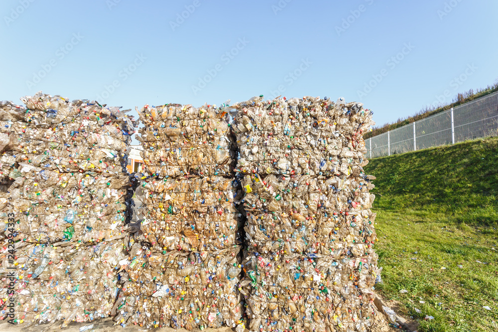 Plastic bales of rubbish at the waste treatment processing plant ...