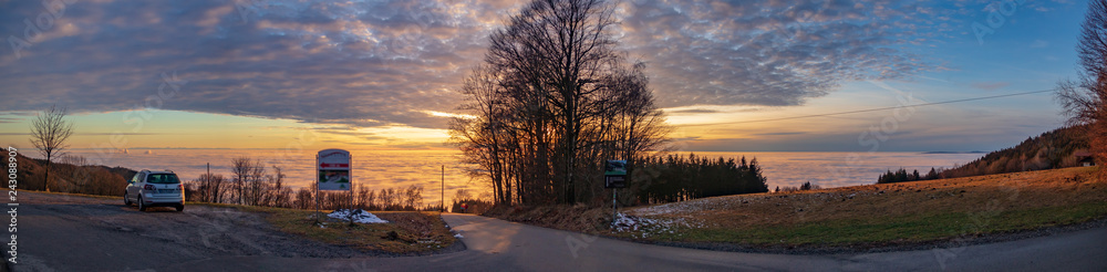 High resolution stitched sunset panorama above the clouds with alps in ...