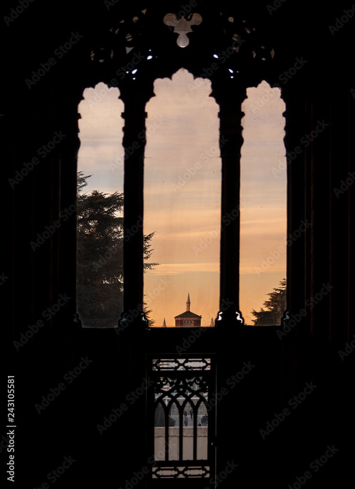 beautiful sunset viewed from a window of a gothic style building Stock ...