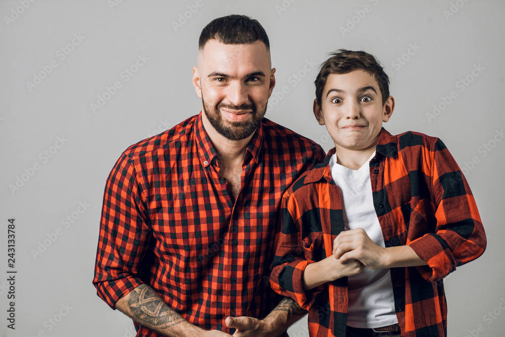 funny man and his kid has done something and they don't want to tell ...