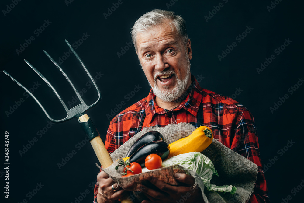 emotional hardworking man with berad standing with abundant rich ...