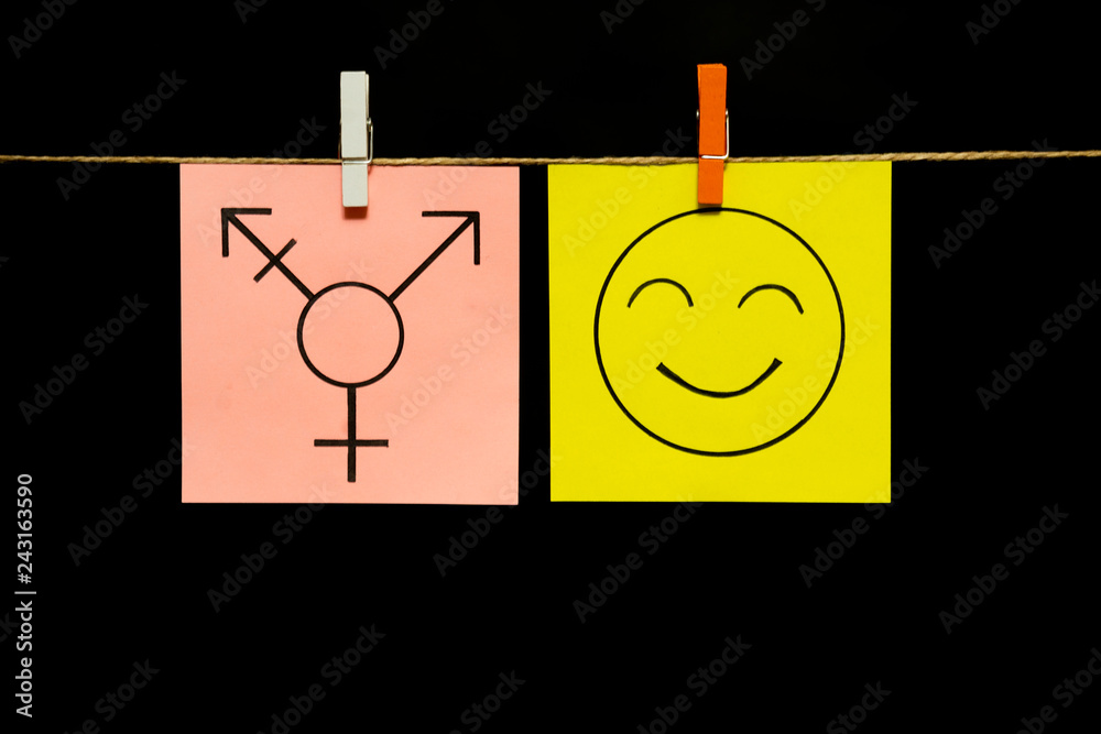 Two stickers. On the left white page image of transgender symbol. On ...