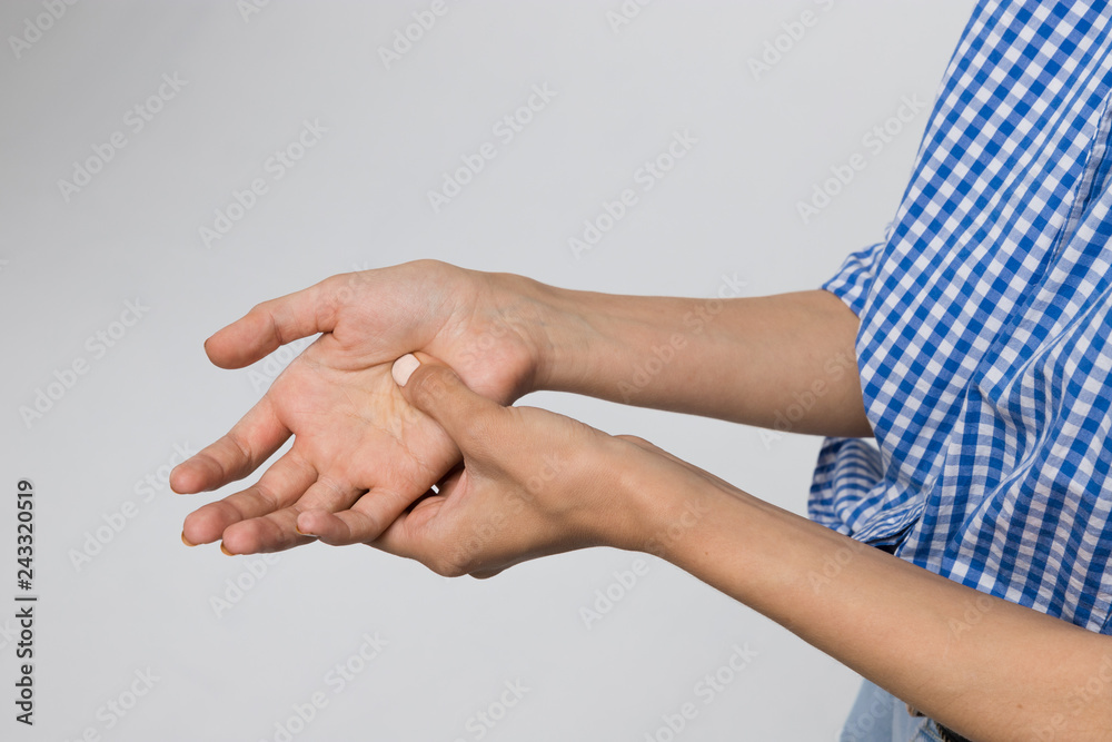 Cropped shot of woman suffering from pain if arms, weakness and ...