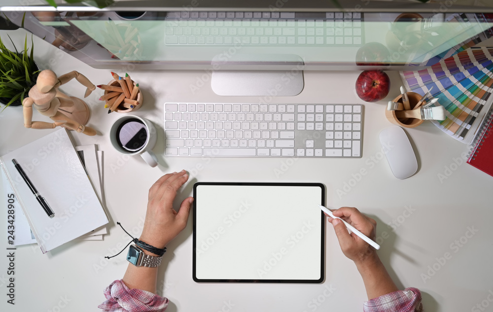 Top view graphic design working with drawing tablet and desktop ...