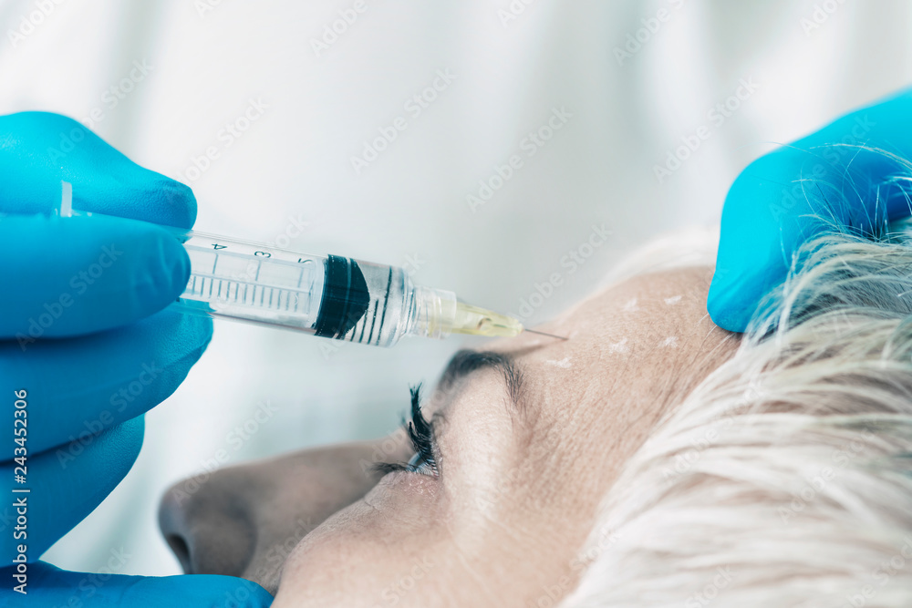 Botulinum Toxin Injections. Senior Woman Receiving Botulinum Toxin ...