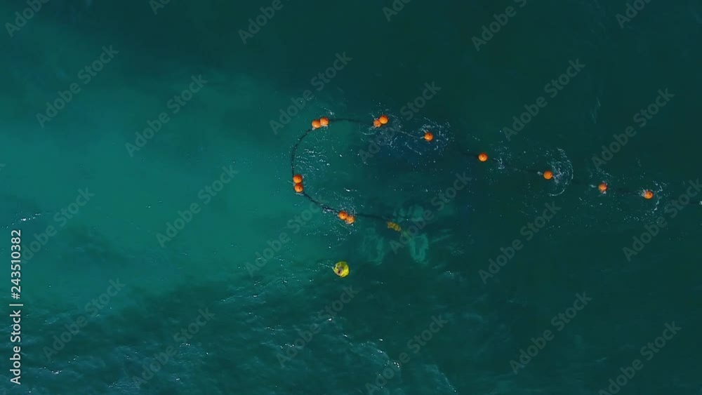 drone above the structure of an oil rig submarine cable station laying ...
