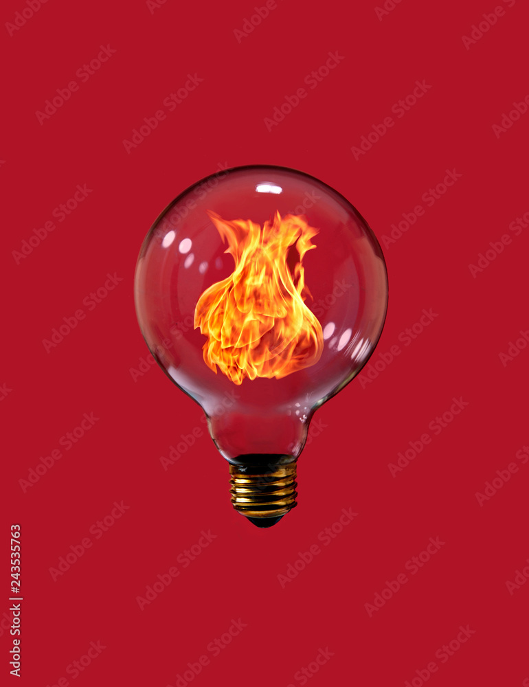 lightbulb with fire Stock Photo | Adobe Stock