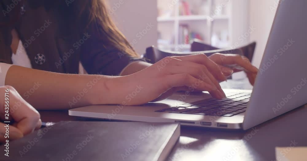 Woman hands using laptop detail.Casual dressed asian chinese,caucasian ...