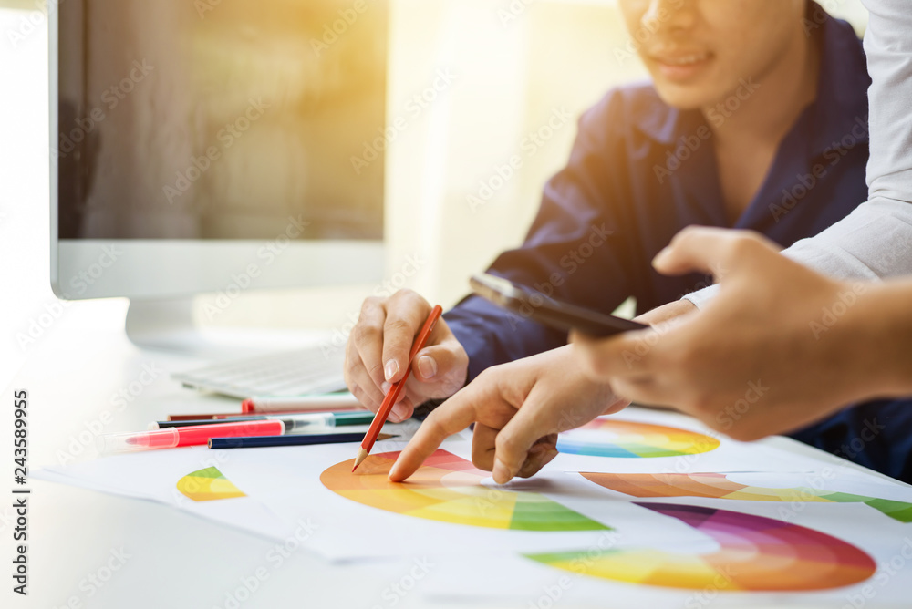 Graphic designer asian working together color swatches ux design editor ...