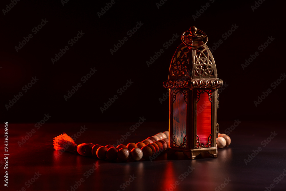 Muslim lamp as Ramadan symbol and tasbih on dark background Stock Photo ...