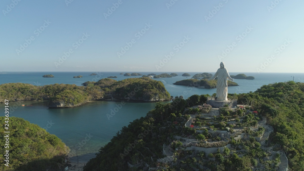 Statue of Jesus Christ on Pilgrimage island in Hundred Islands National ...