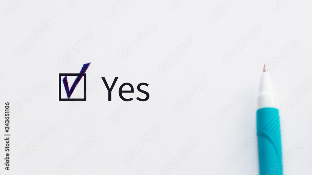 Yes - checkbox with a tick on white paper with blue pen. Checklist ...