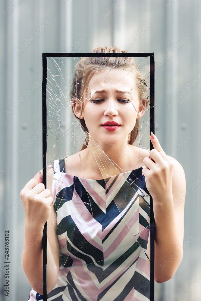 Beautiful teen girl holding broken glass in her hands. concept to stop ...