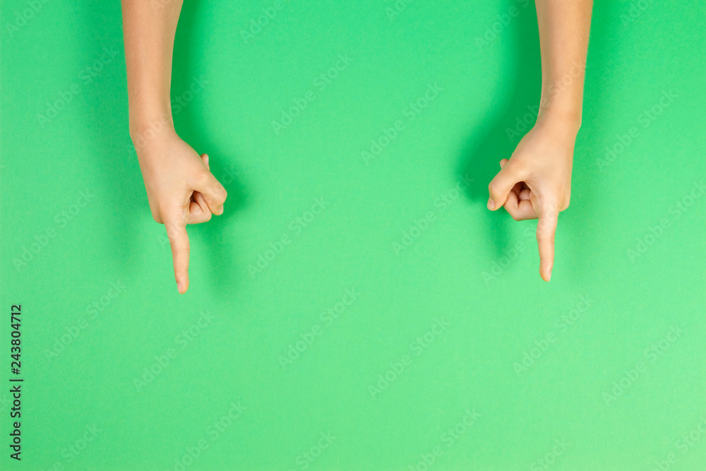 Children hands pointing on pastel green background Stock Photo | Adobe ...
