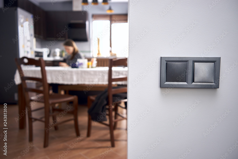 switch and socket in the kitchen background Stock-Foto | Adobe Stock