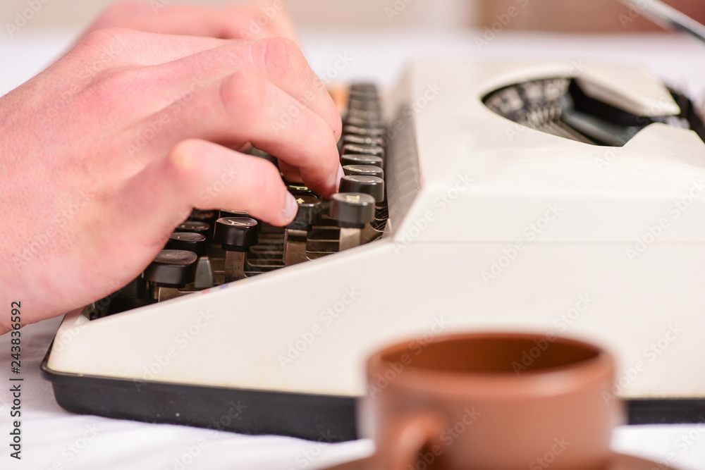 Hands typing retro writing machine. Old typewriter and authors hands ...