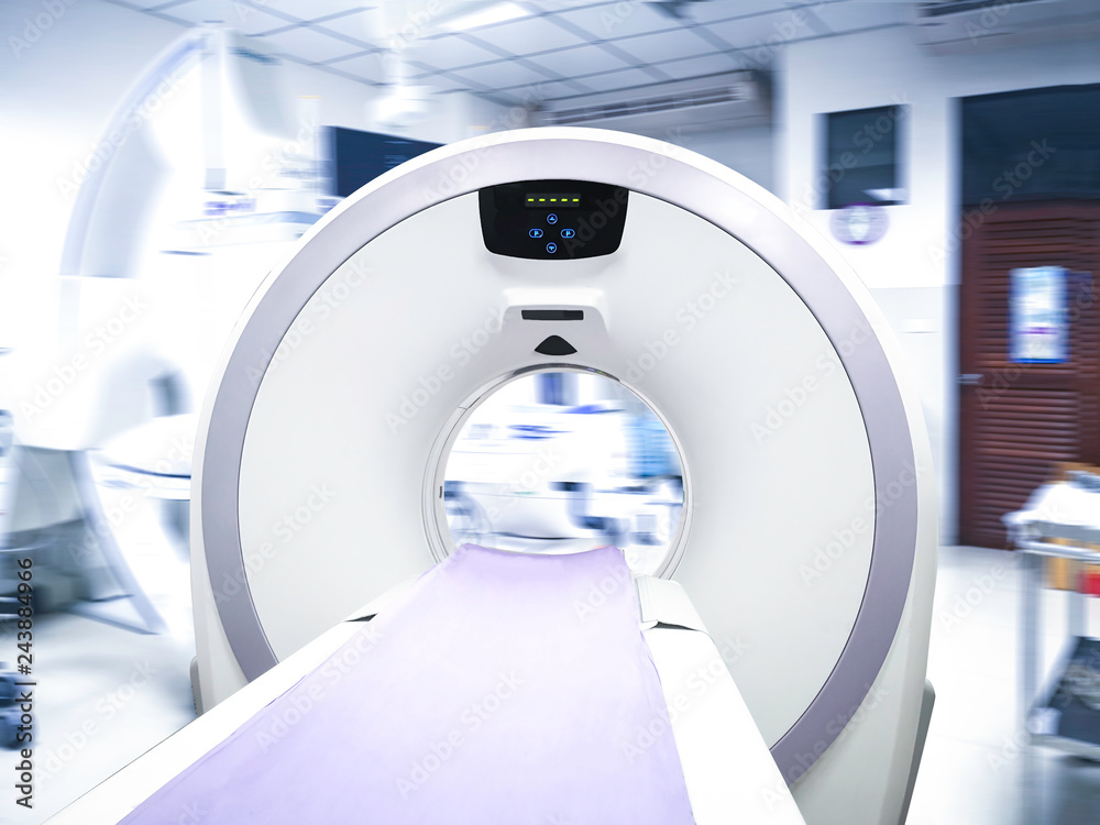 CT Scanner ( Computed Tomography ) isolated on motion blurred CT Scann ...