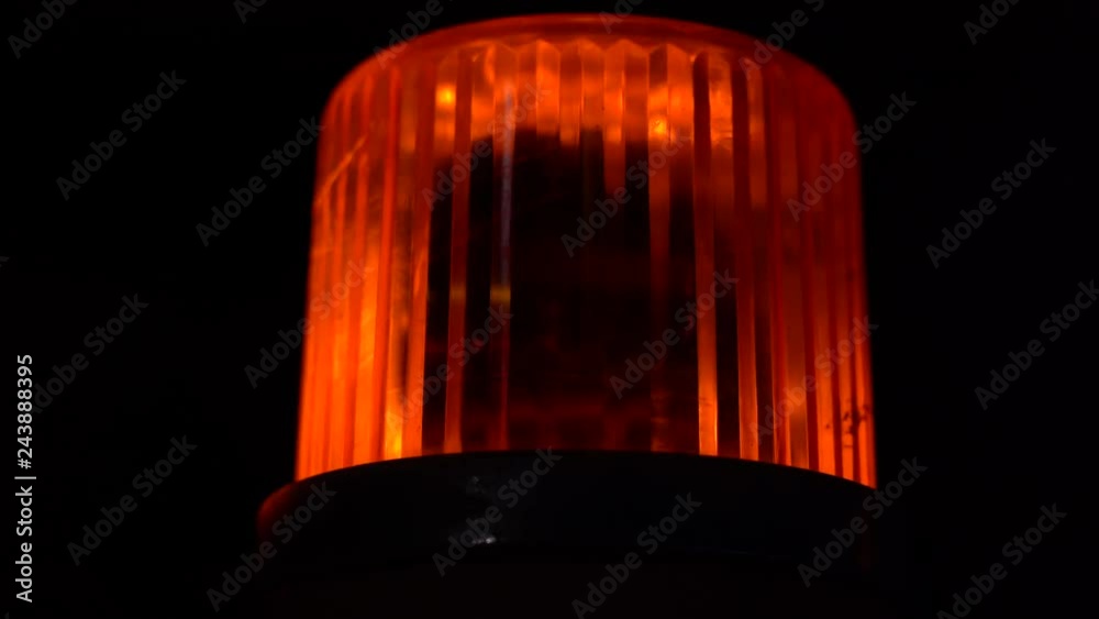 Close-up of a yellow siren, alarm and emergency flashing. Light is ...