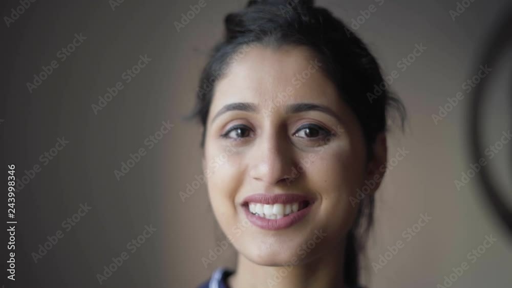 Vídeo do Stock: Face of happy successful Latin model enjoying shooting ...