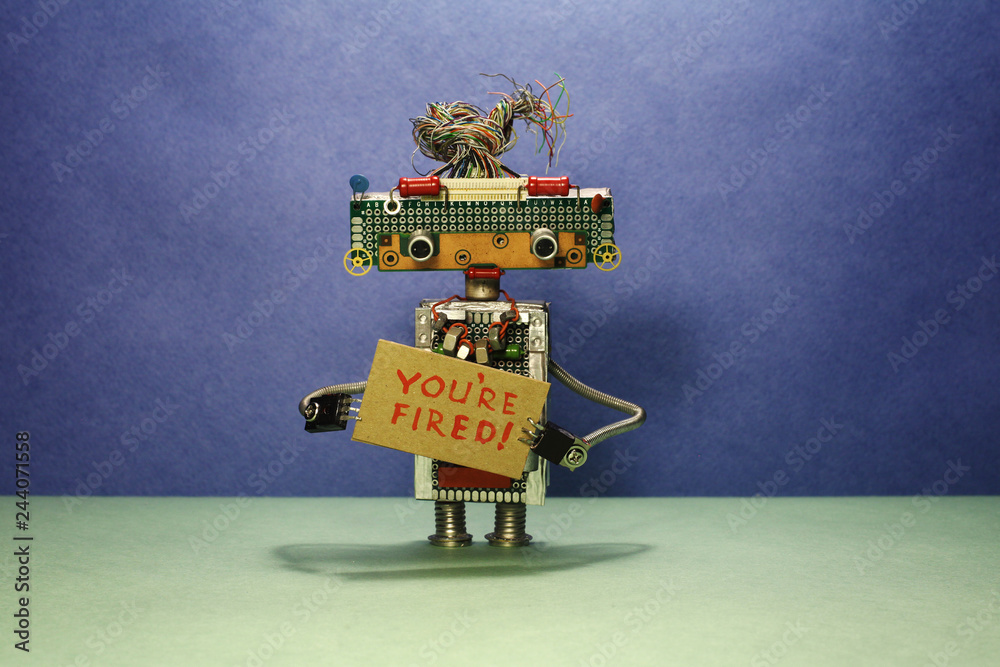 Robot boss dismisses personnel. Robot shows cardboard sign with text ...