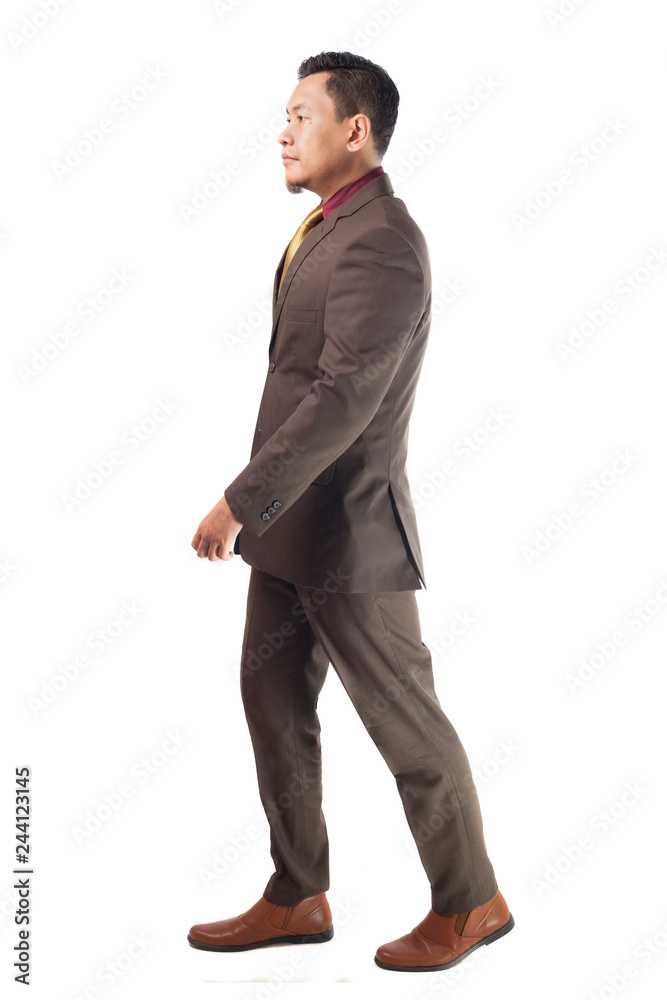 Young Asia Businessman Walking, Side View Stock Photo | Adobe Stock