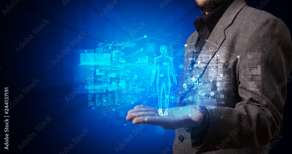 Young person holding hologram projection displaying health related ...