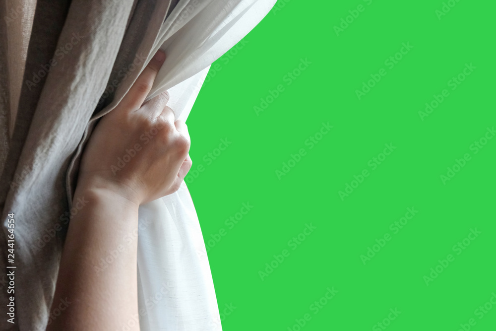 Woman's hand opening curtains in the bedroom with green screen ...