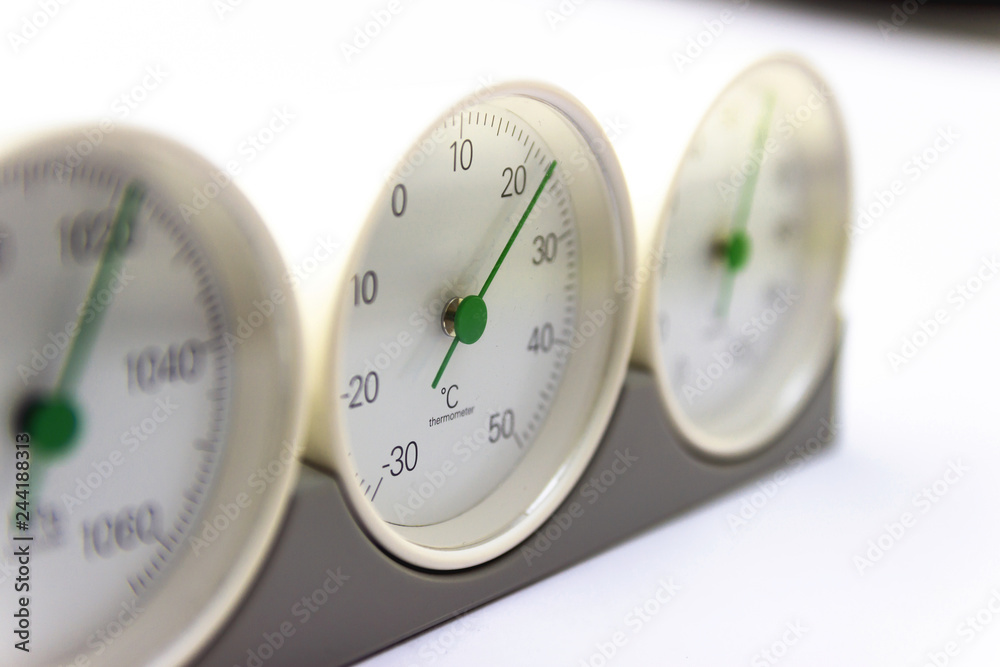 modern, round barometer, thermometer, hygrometer. Analog device for ...