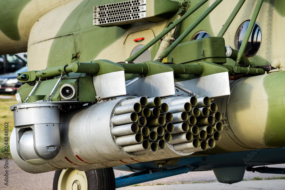 Military helicopter equipped with guided anti-tank missiles and ...