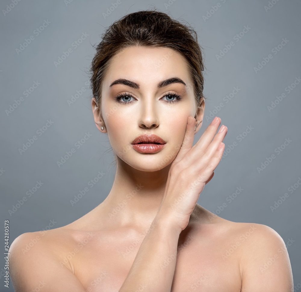 Beautiful face of a young woman with clean fresh skin Stock Photo ...