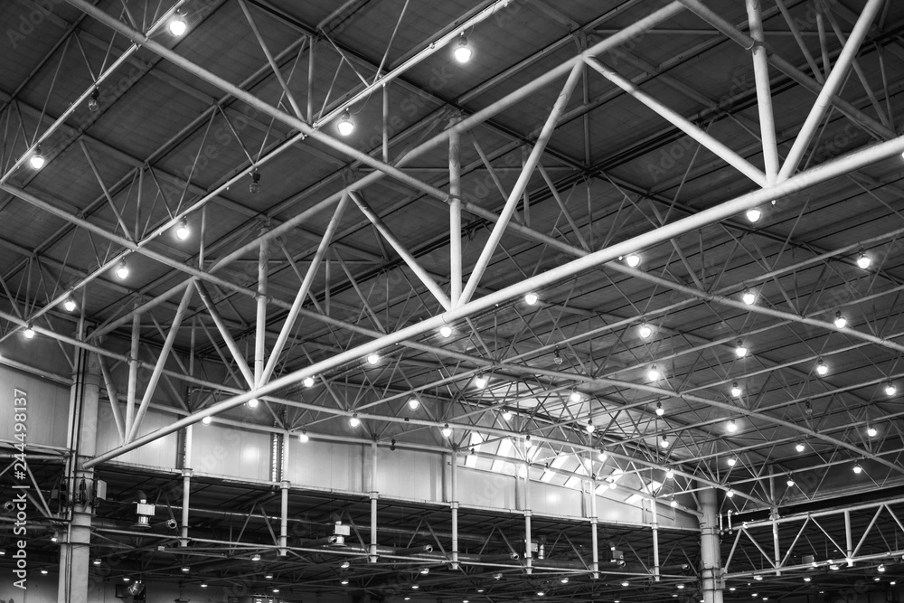 Interior of warehouse. large metal structures, ceiling. roof. concept ...