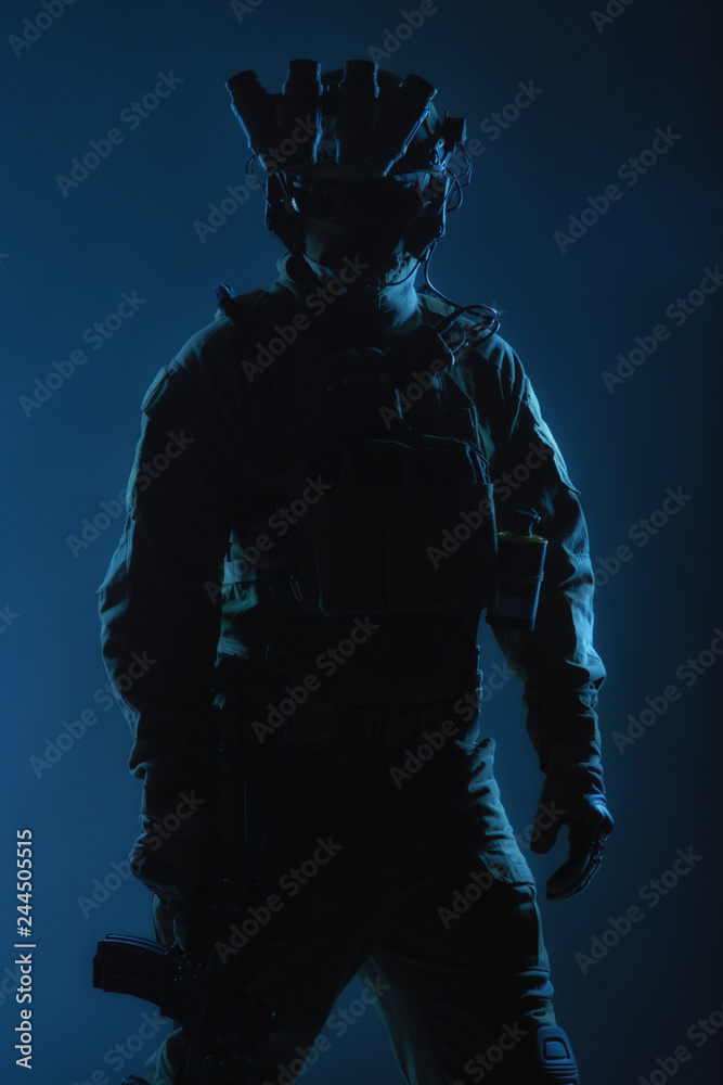 Army special forces soldier in tactical ammunition, night vision device ...
