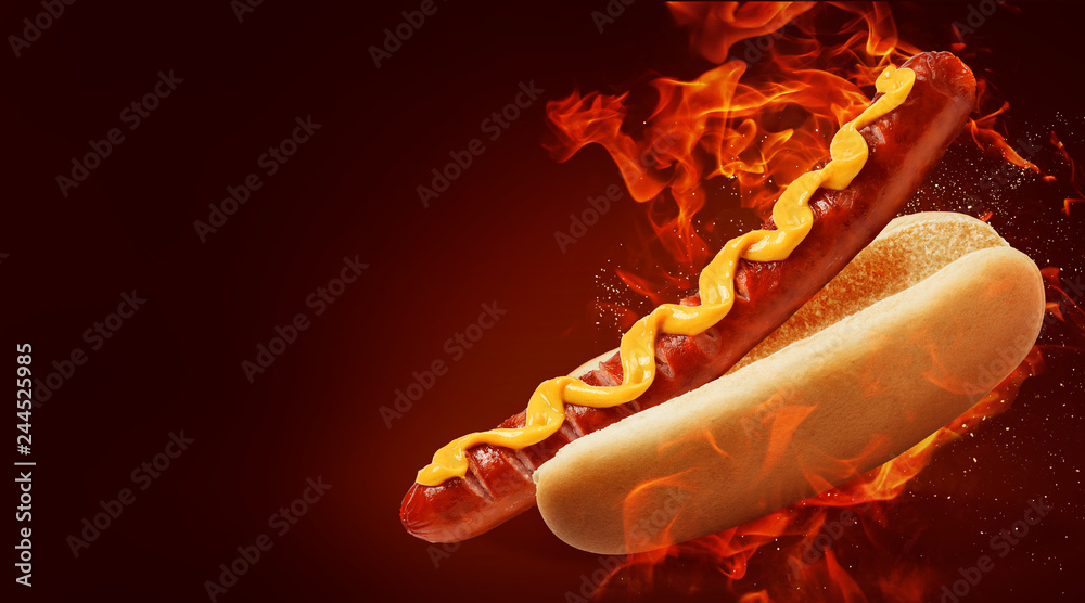 hot dog with big sausage and mustard on fire background Stock Photo ...