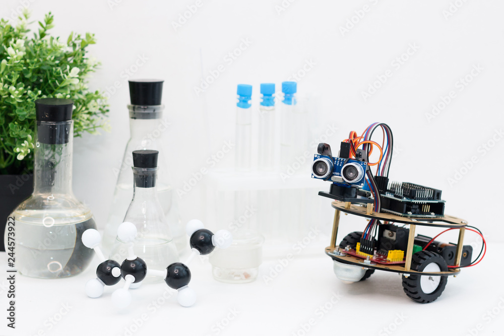 Hand made robot working on the arduino platform. White background. Free ...