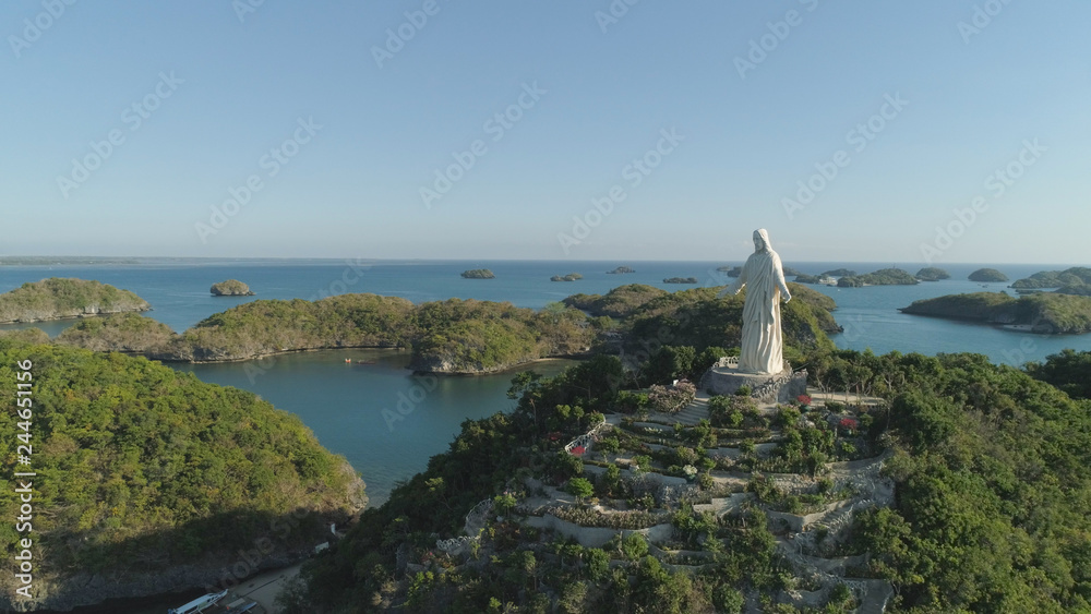 Statue of Jesus Christ on Pilgrimage island in Hundred Islands National ...
