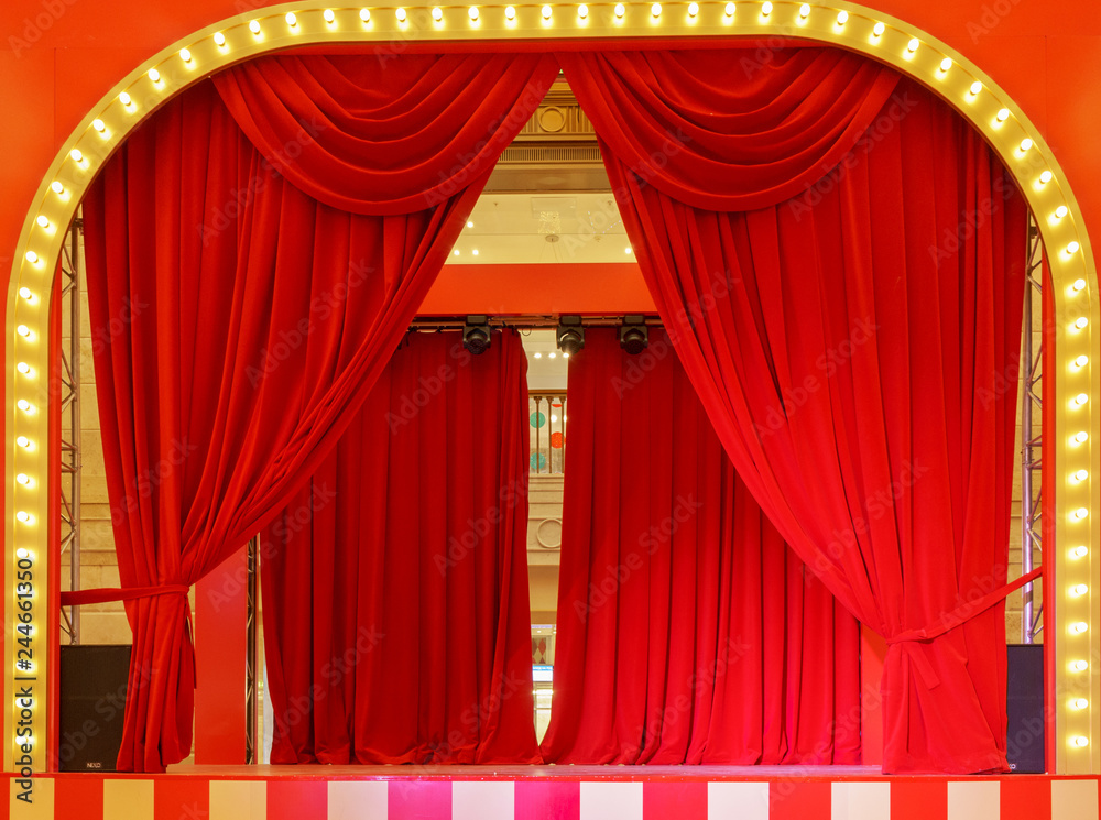 Theater stage with red curtains and spotlights. Theatrical scene in the ...