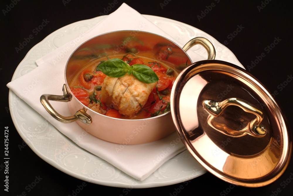 Italian food recipe, stewed monkfish in tomato sauce. Stock Photo ...