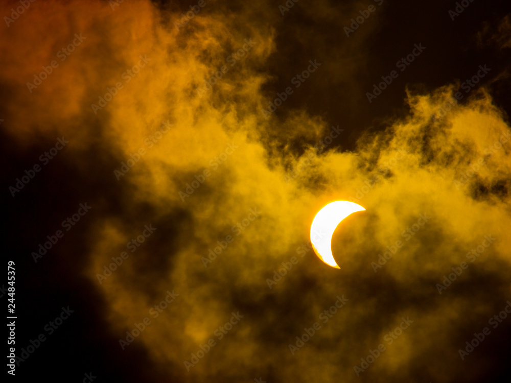 Moody, Vibrant Orange Nature Photo of a Partial Crescent Shaped Solar ...