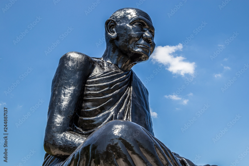 Big statue black monk in Wat Kaew Manee Si Mahathat, Phang Nga, Thailand Stock Photo | Adobe Stock