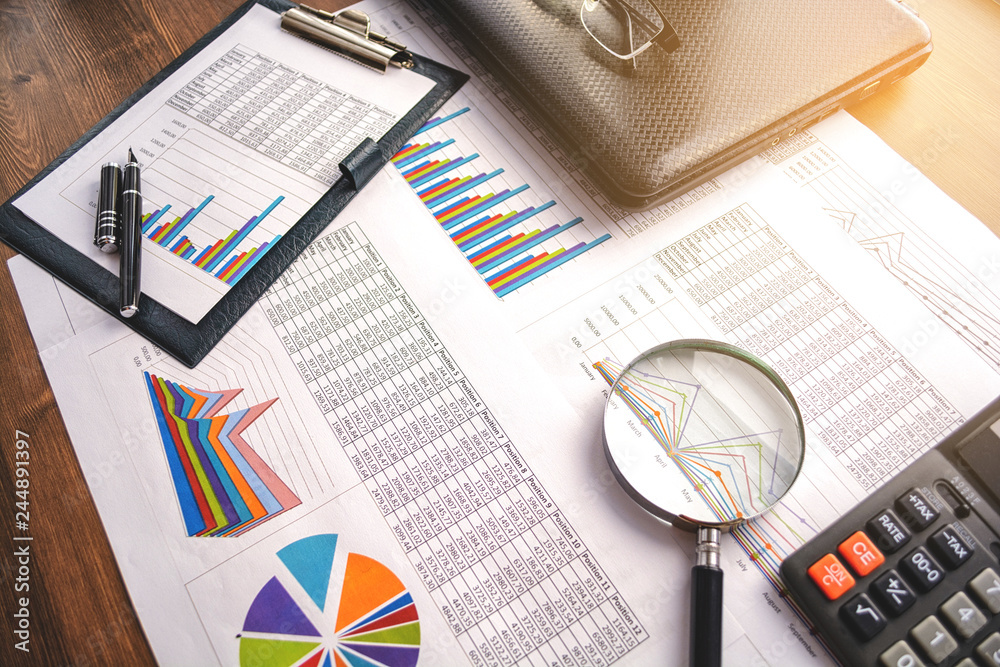 Business accessories (notebook, magnifier, calculator, planchette ...