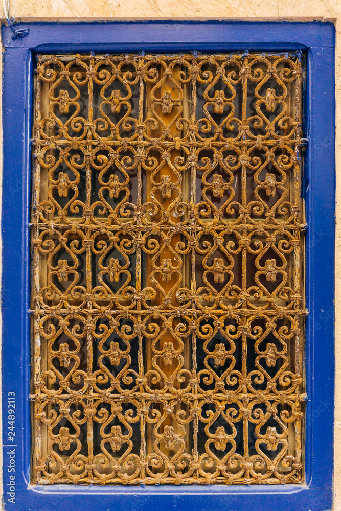 Old steel lattice pattern on the arabic window in Morocco (Marrakesh ...