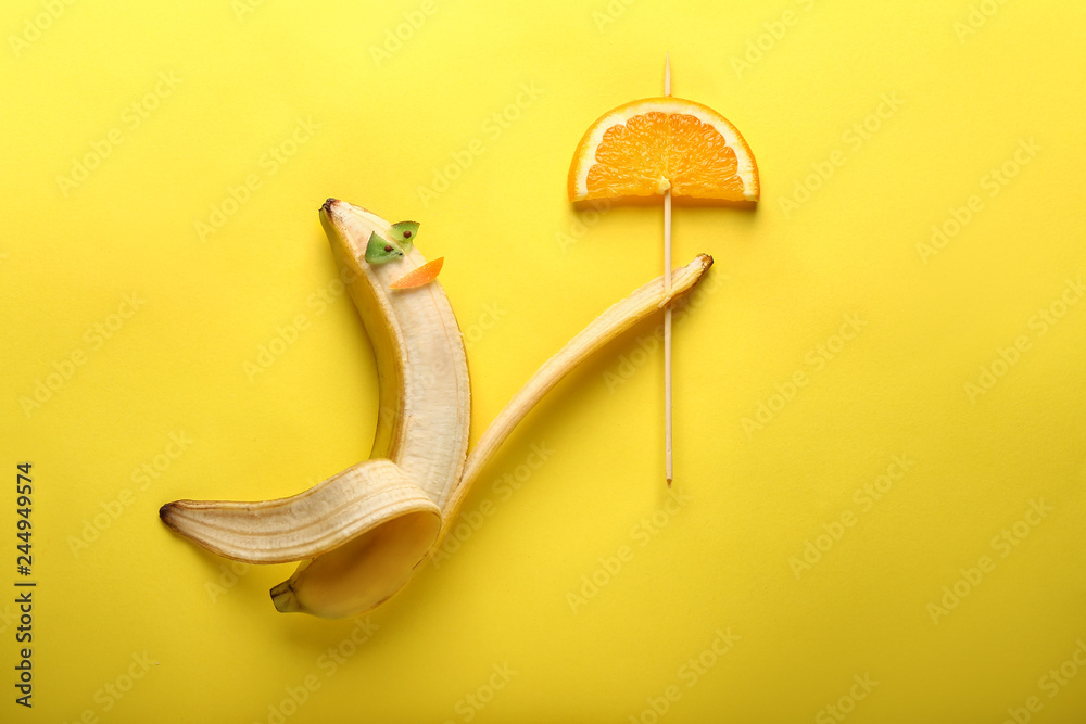 Creative composition with tasty fresh banana on color background Stock ...