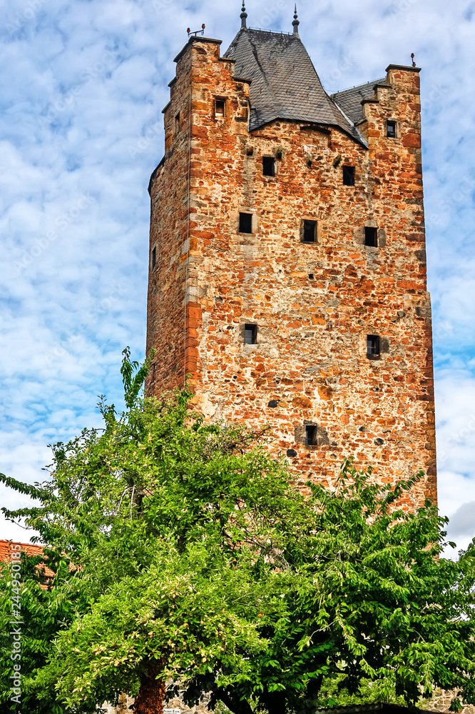 Grey tower as the oldest medieval fortified tower in Germany in the ...