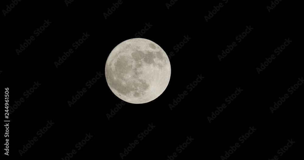 Clean and crisp shot of full moon against solid black sky. Easy for ...