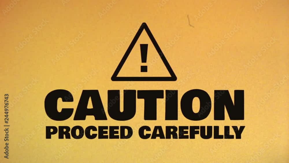 Caution Hazard Icon On Bad Old Film Tape/ Animation of a caution ...